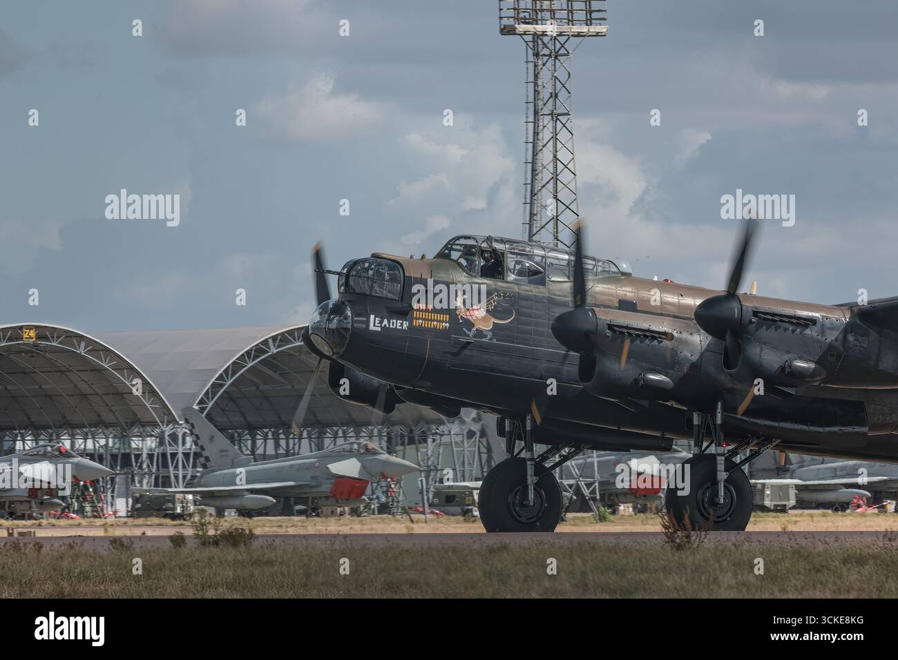 The pilot waves from the Battle of Britain Memorial Flight Avro ...