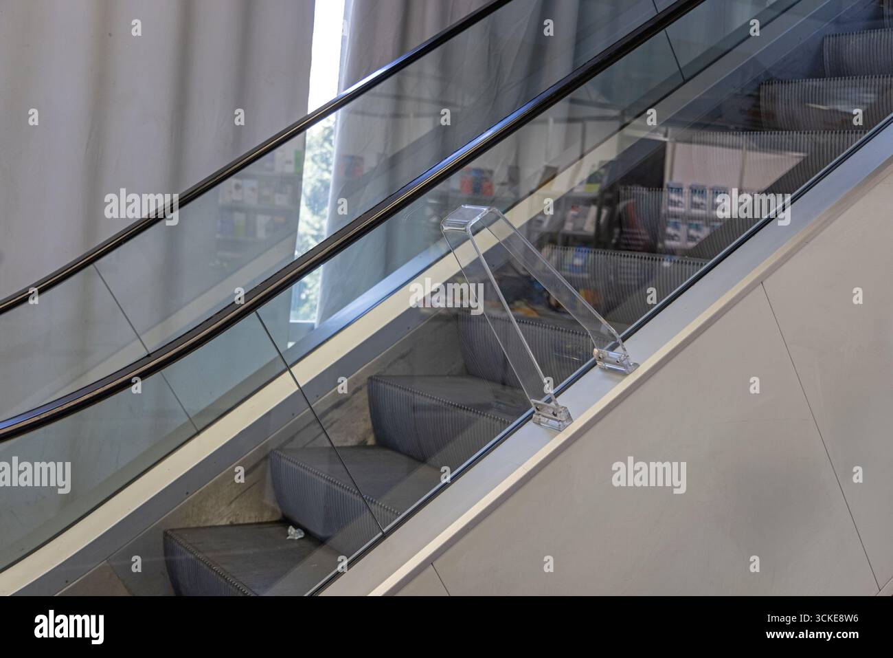 Acryl Barrier Safety Device at Exterior of Escalator Stock Photo - Alamy