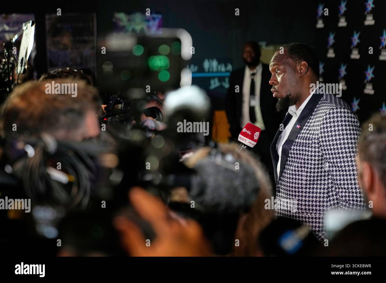 Former sprinter, Jamaica's Usain Bolt is interviewed as he arrives for ...