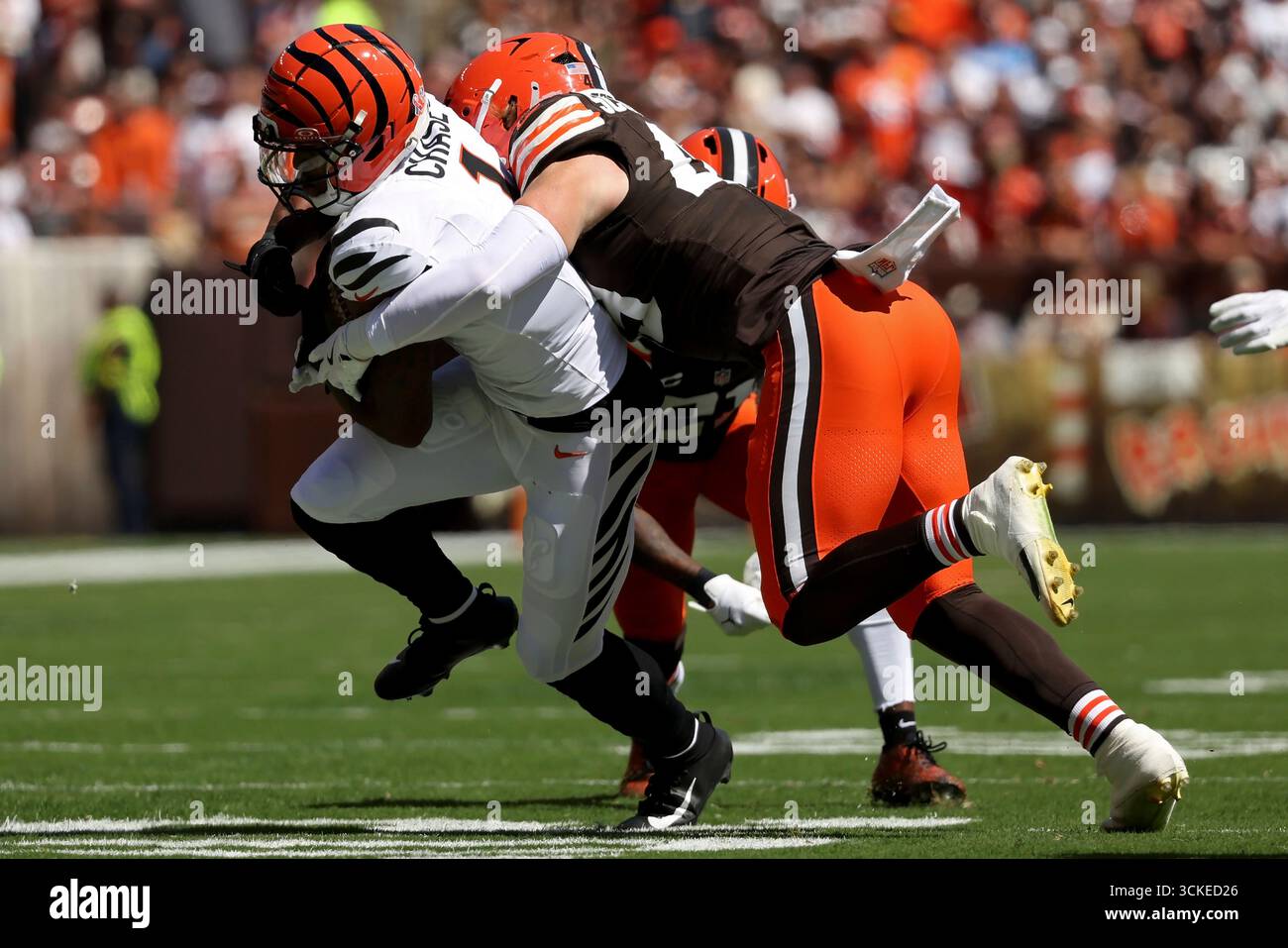 Cincinnati Bengals wide receiver Ja'Marr Chase (1) is tackled by ...