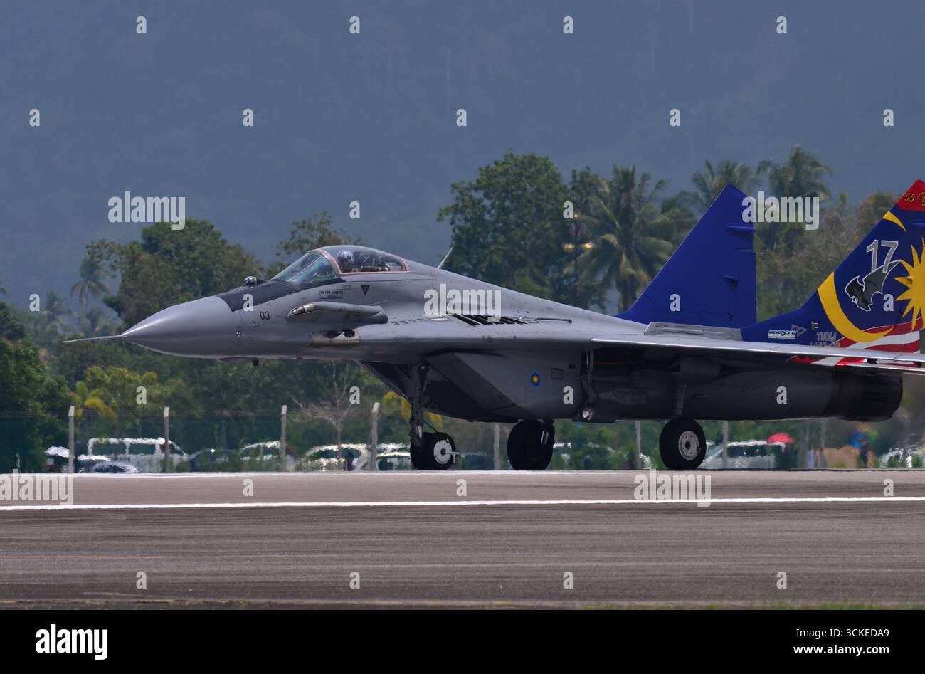 Fighter jet taxiing on runway during military air force training ...