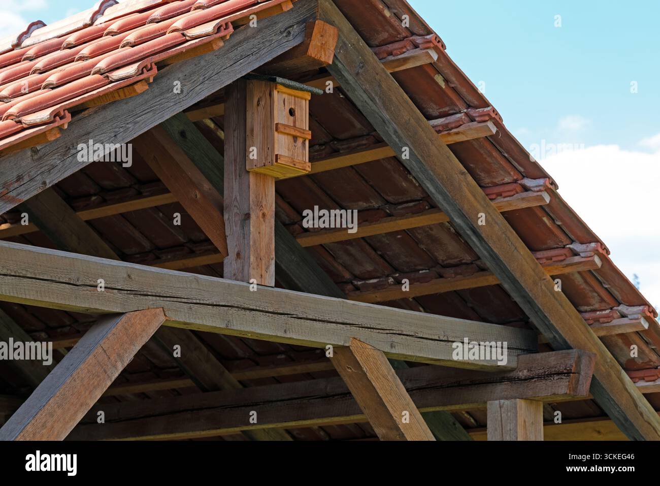 Gable roof with cross beams and roof tiles Stock Photo - Alamy