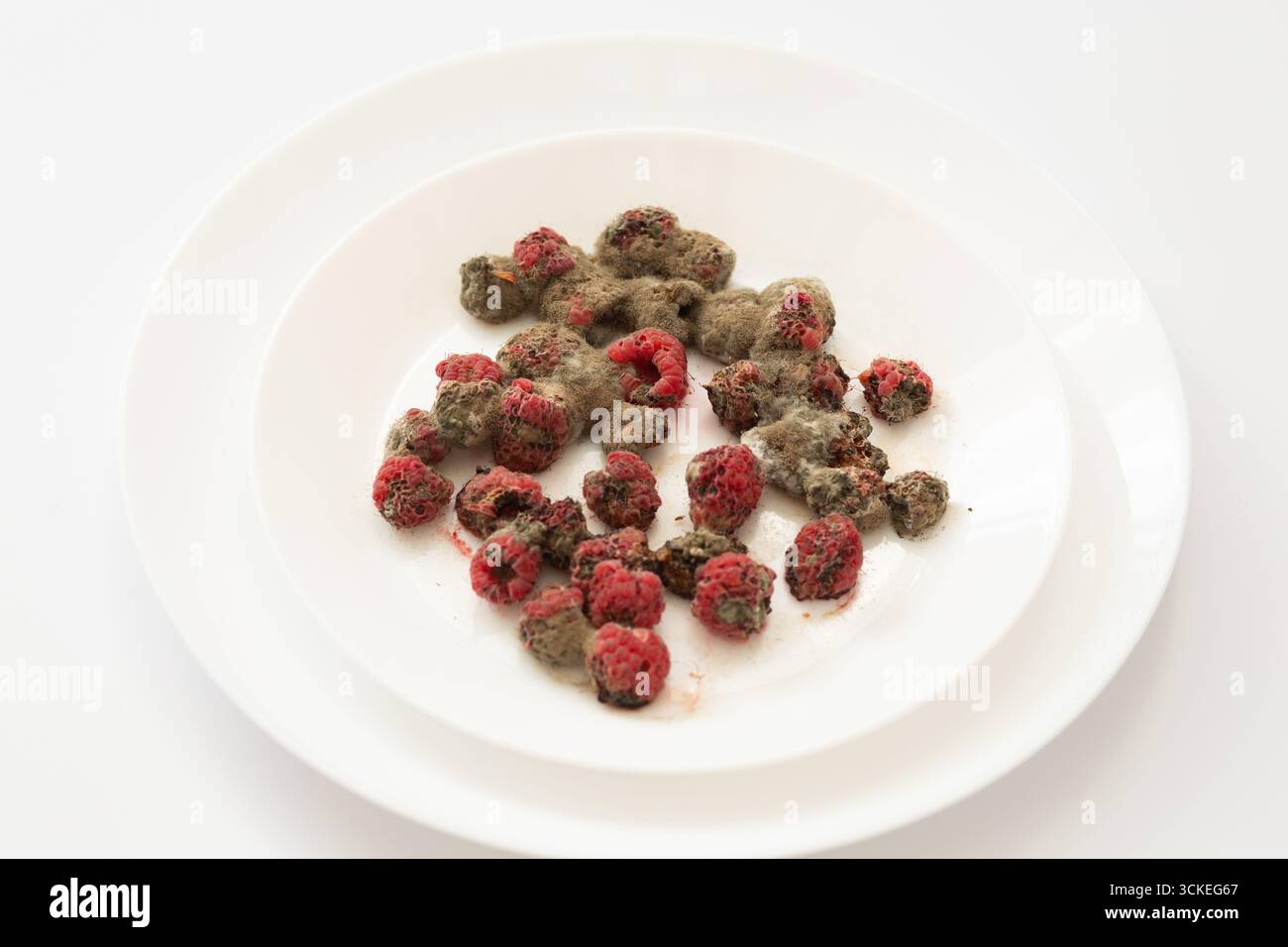 Spoiled raspberries concept hi-res stock photography and images - Alamy