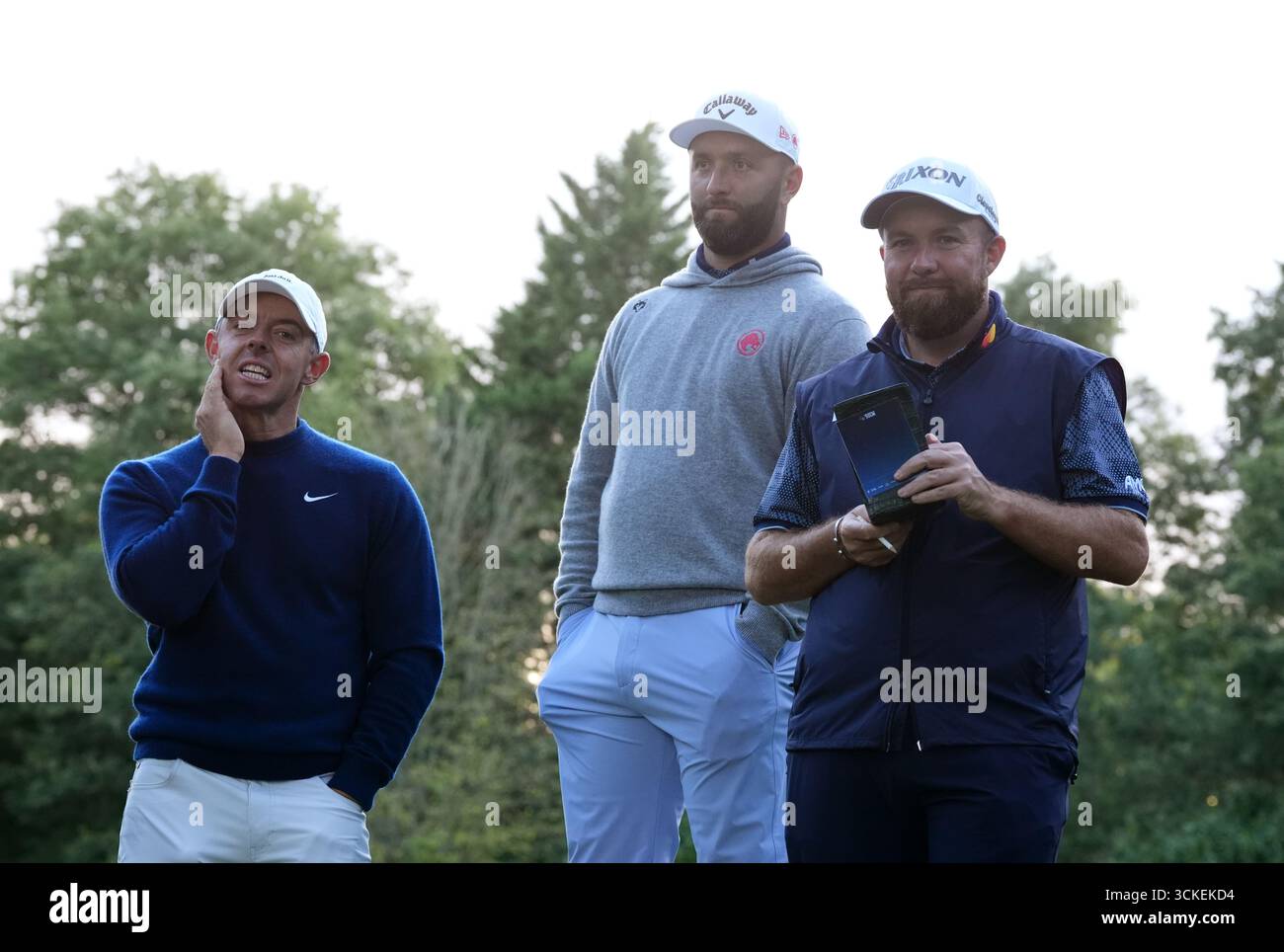 (left to right) Rory McIlroy, Jon Rahm and Shane Lowry waiting on the ...