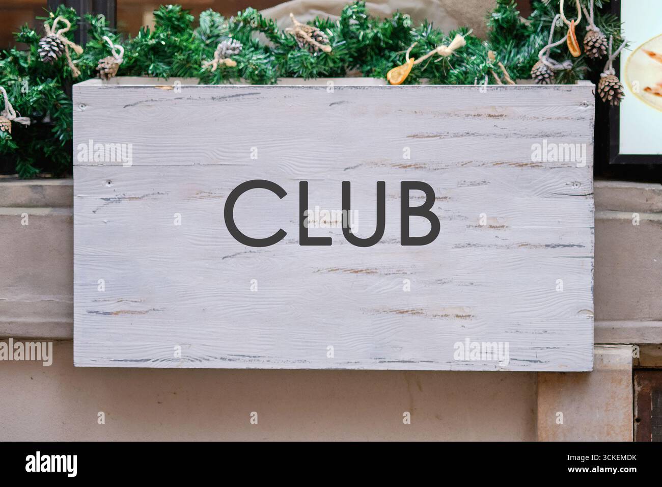 Club Concept. Copy space. Word club written on A blank wooden sign ...