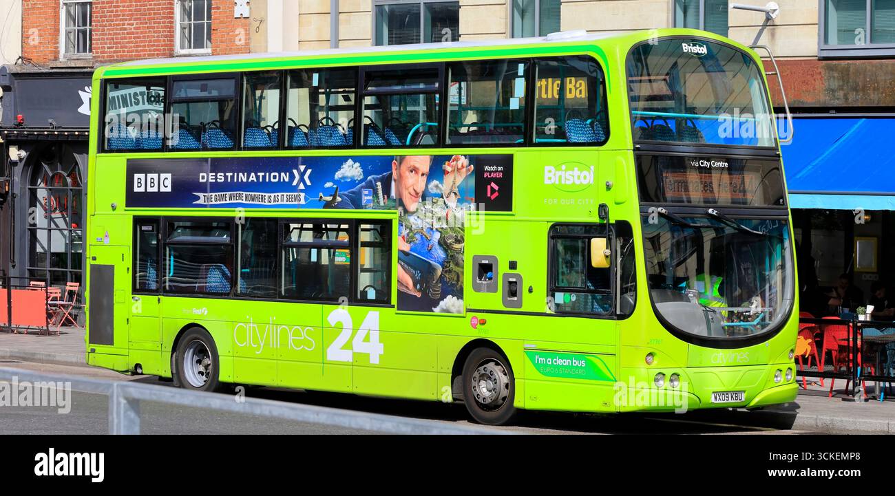 Bristol CityLines vivid green double decker bus with BBC advertisement ...