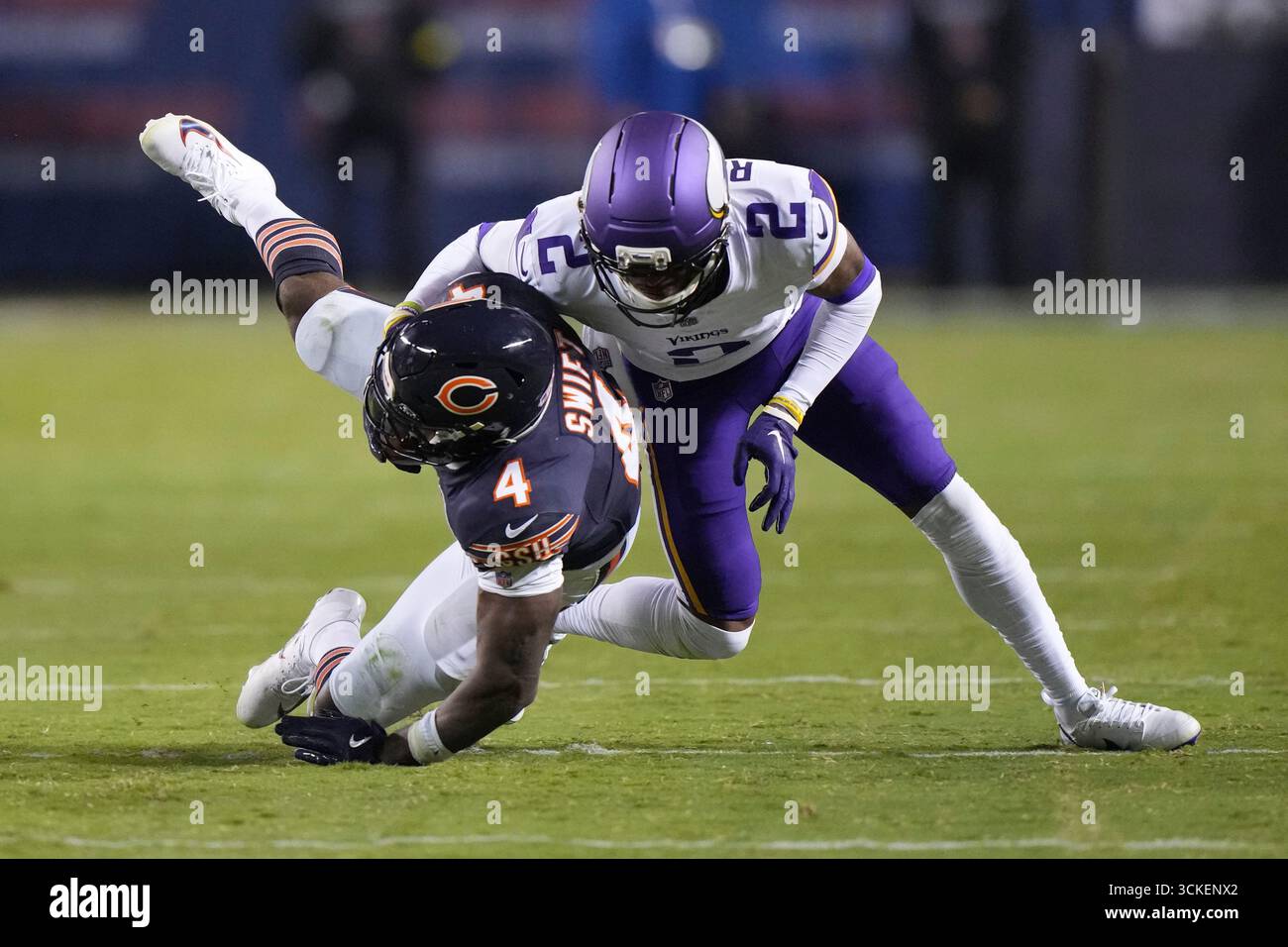 Chicago Bears running back D'Andre Swift (4) is tackled by Minnesota Vikings cornerback Isaiah ...