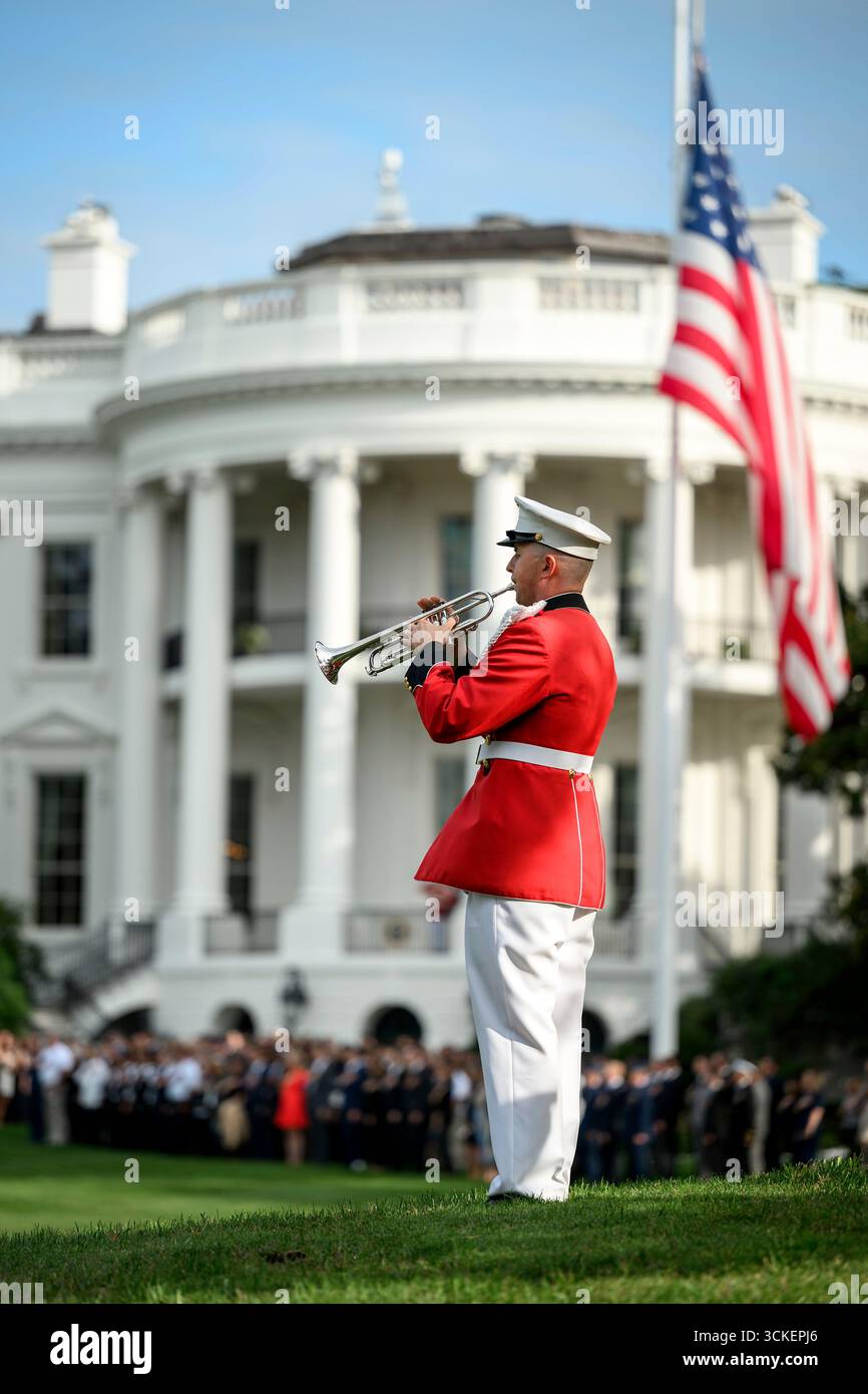 Washington, United States. 11th Sep, 2025. A military honor guard plays ...