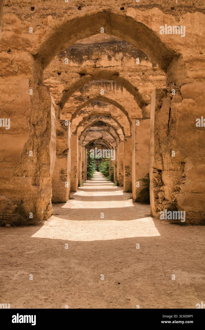 Old Ruined Arches in a Moroccan Kasbah - A view through an open wooden ...