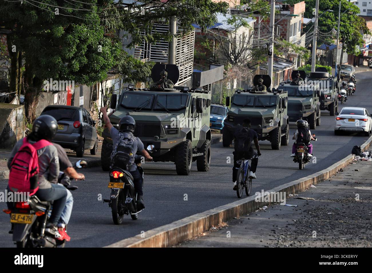 Military patrol the Siloé neighborhood in Cali, Colombia, Thursday ...