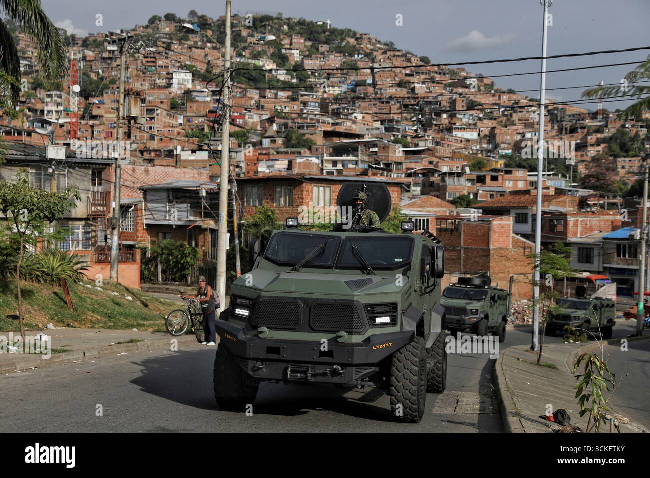 Military patrol the Siloé neighborhood in Cali, Colombia, Thursday ...
