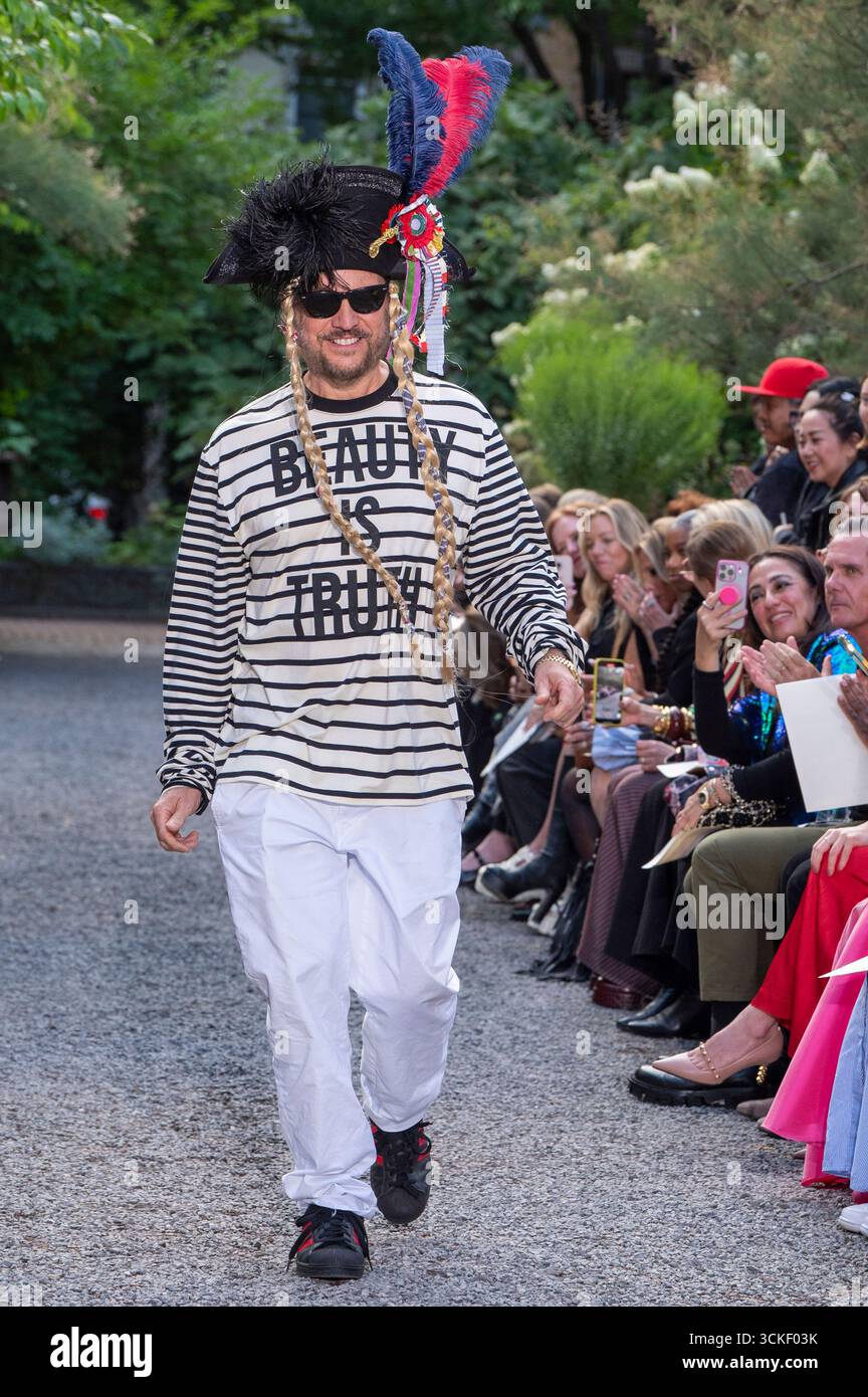 Johnson Hartig walks the runway finale for the Libertine fashion show ...