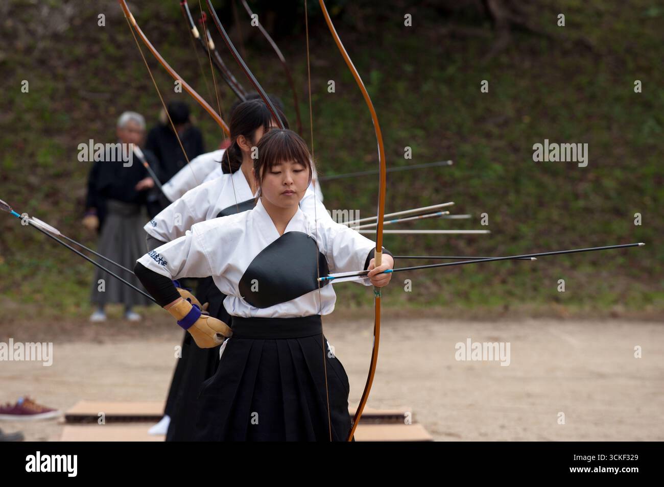 Traditional Japanese martial art of "kyudo" (弓道), or the way of the bow ...