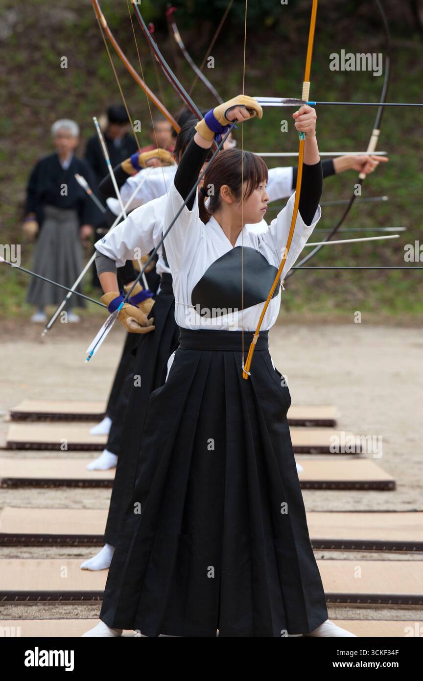 Traditional Japanese martial art of "kyudo" (弓道), or the way of the bow ...