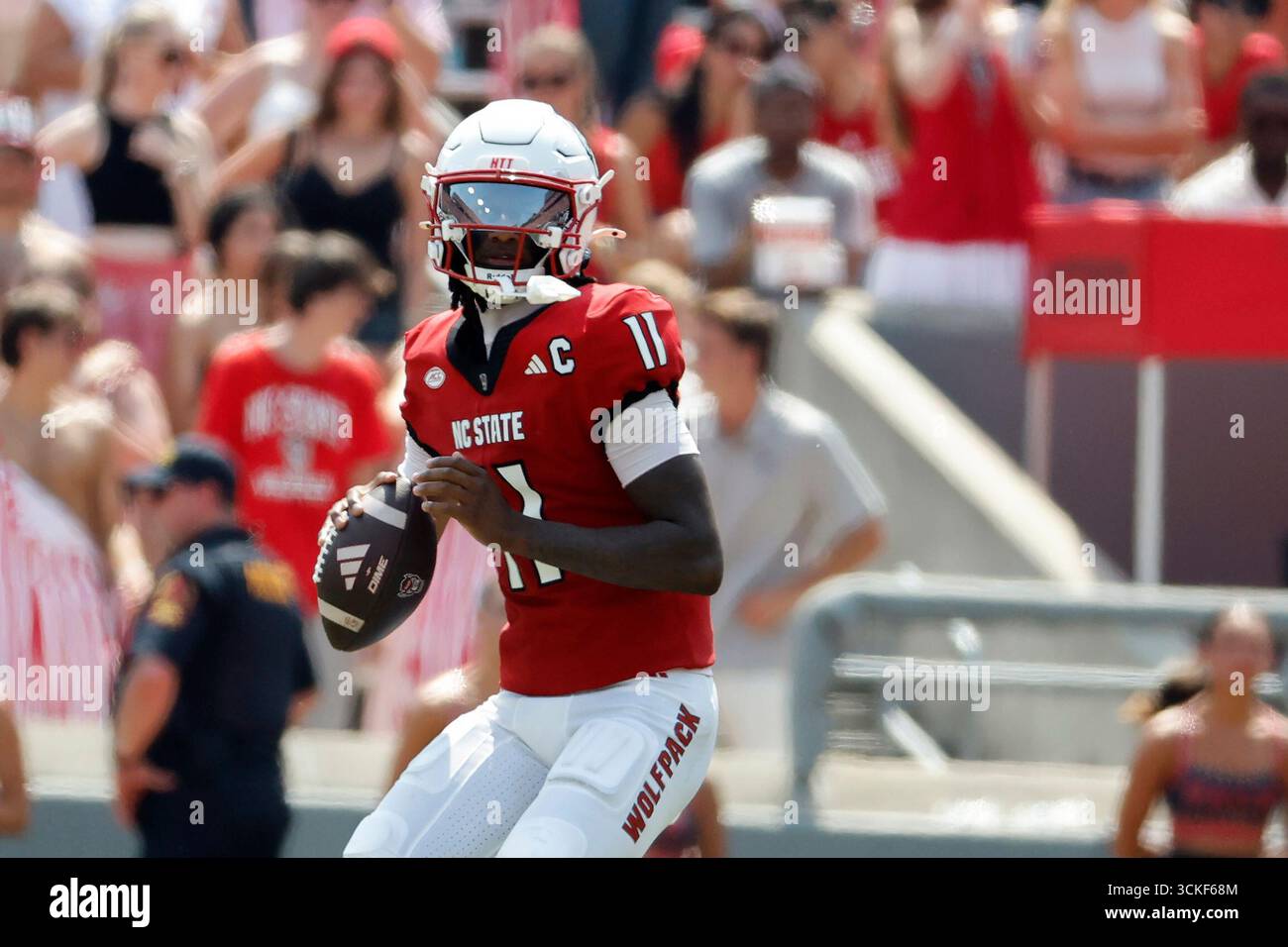North Carolina State quarterback CJ Bailey (11) prepares to throw the ball against Virginia ...