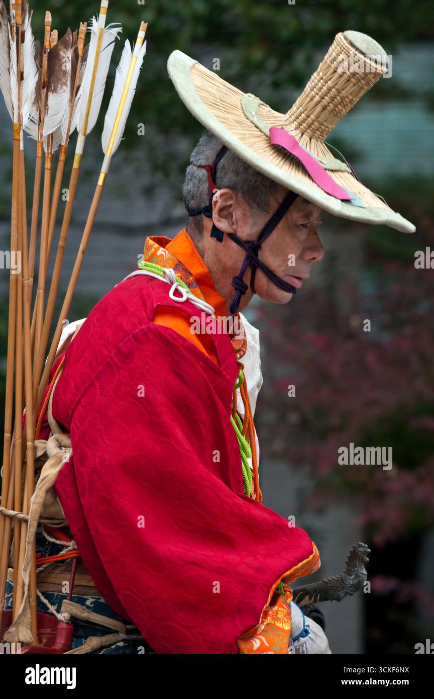 Japanese senior archer on horseback wearing a traditional costume ...