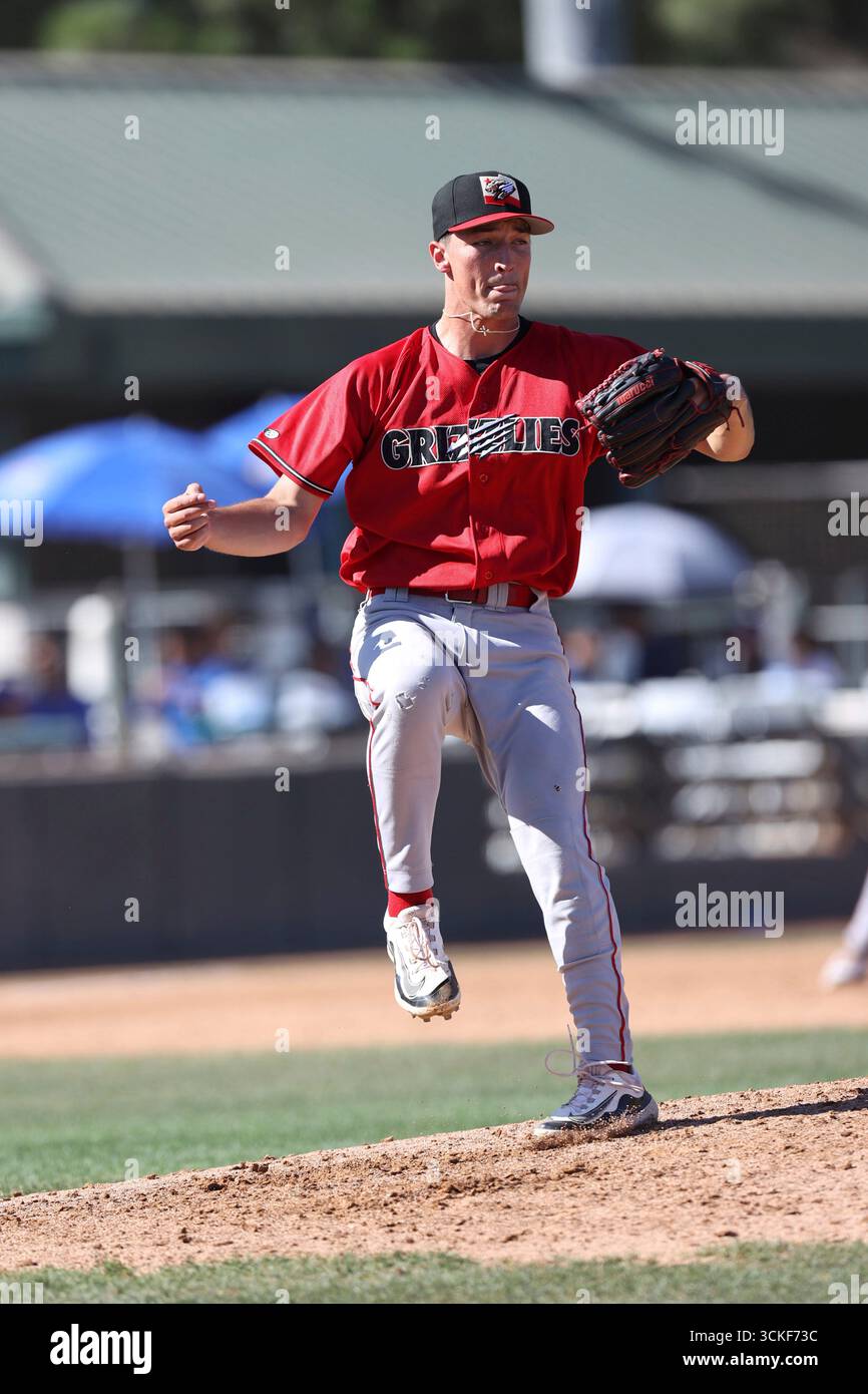 Zach Harris (22) of the Fresno Grizzlies pitches against the Rancho ...