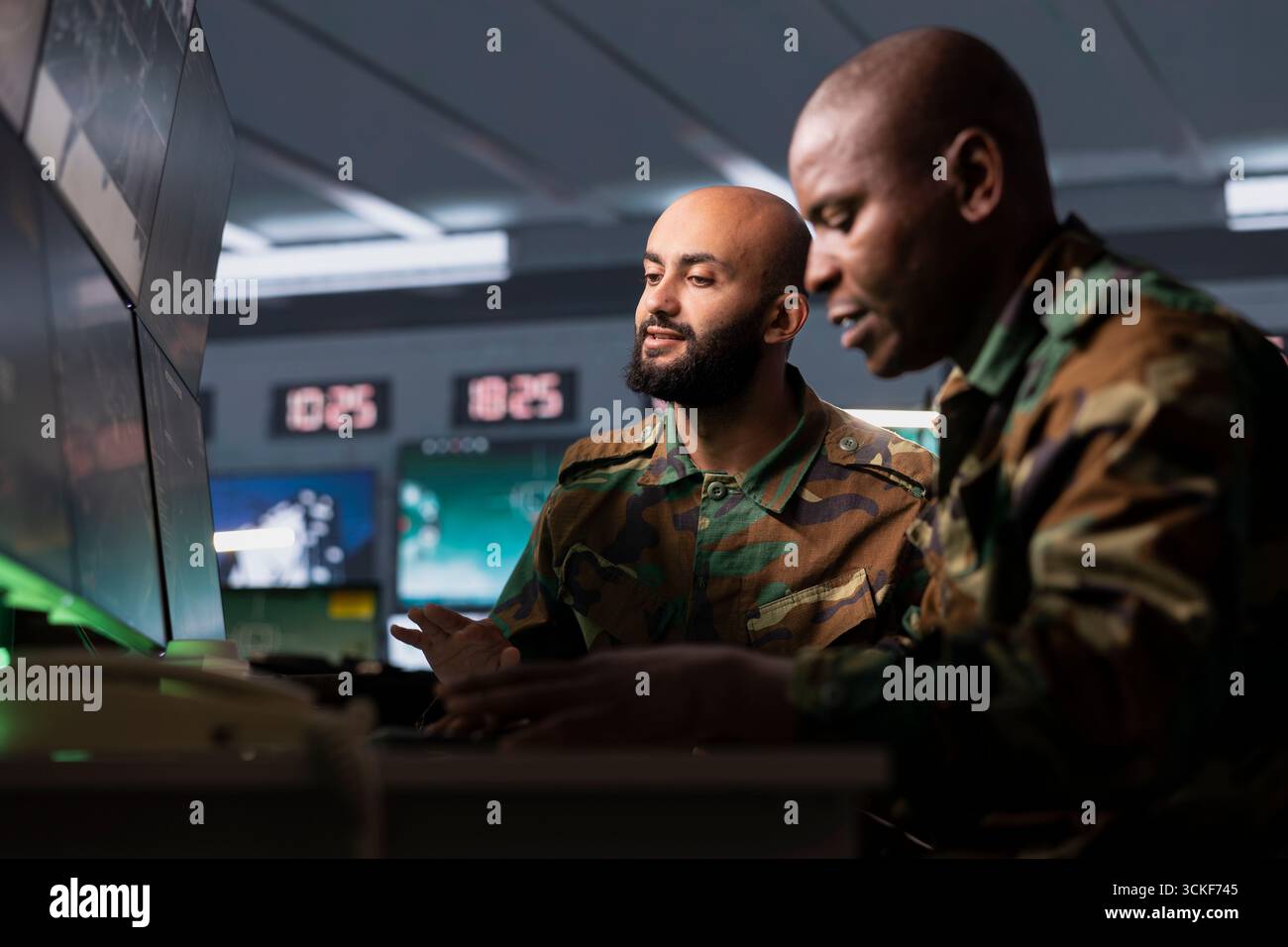 Military team conducts tactical reconnaissance in command center ...