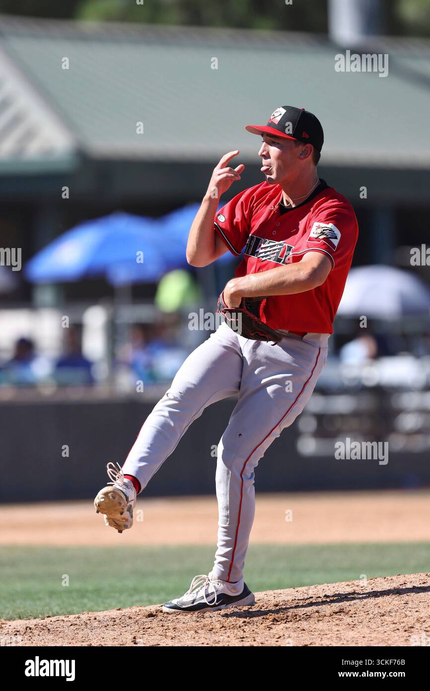 Zach Harris (22) of the Fresno Grizzlies pitches against the Rancho ...