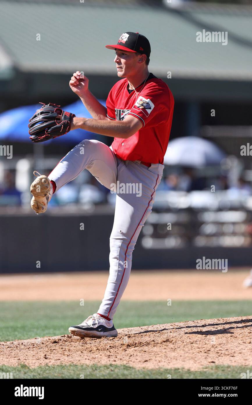 Zach Harris (22) of the Fresno Grizzlies pitches against the Rancho ...