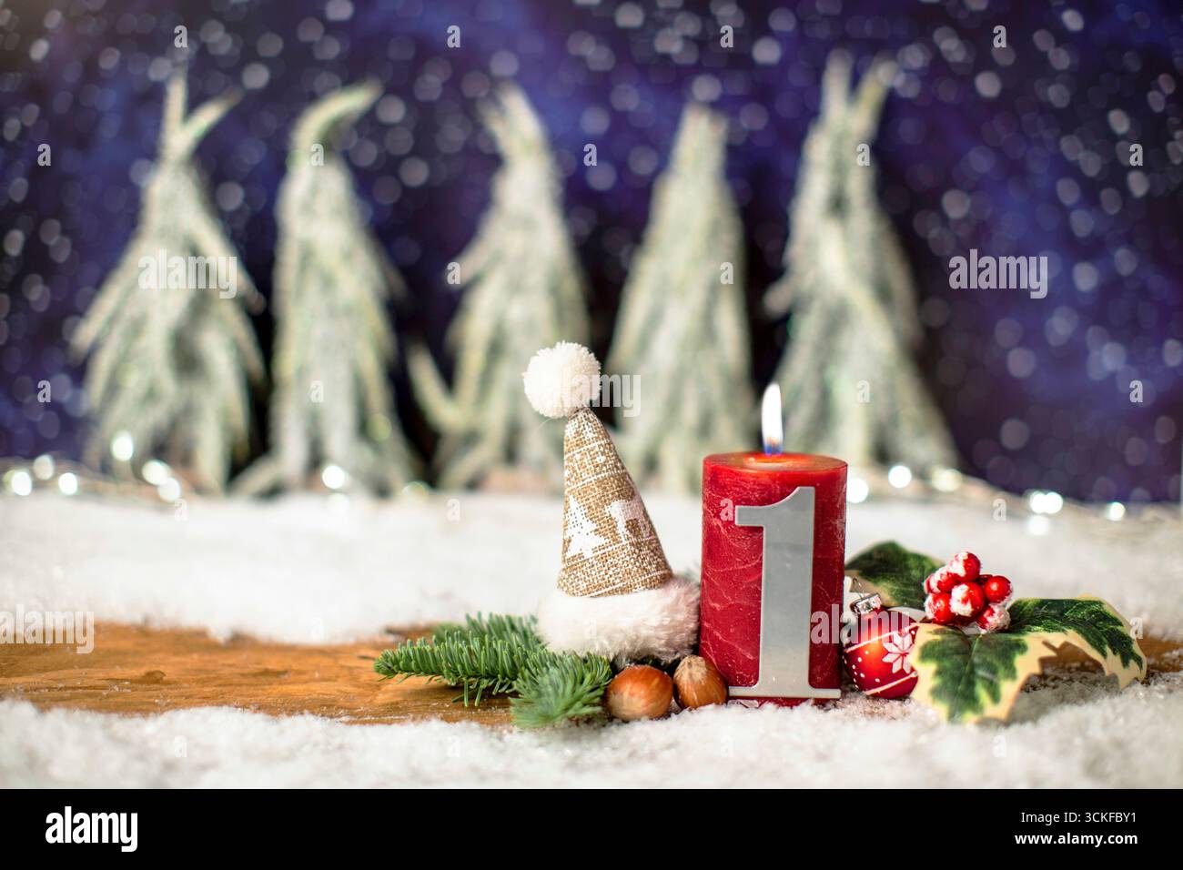 Christmas decoration with a candle, 1st Advent Stock Photo - Alamy