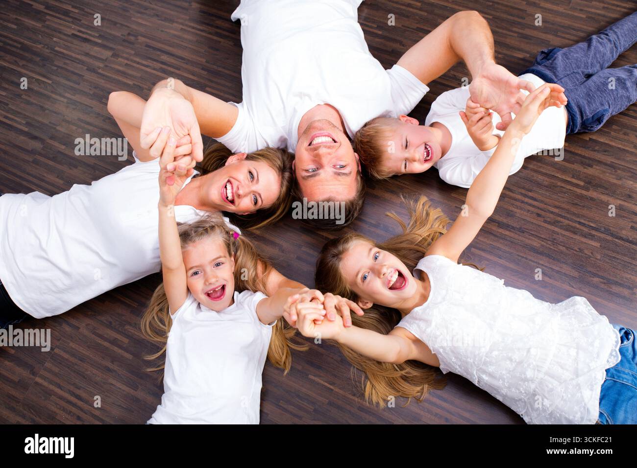 Team three children adults hi-res stock photography and images - Alamy