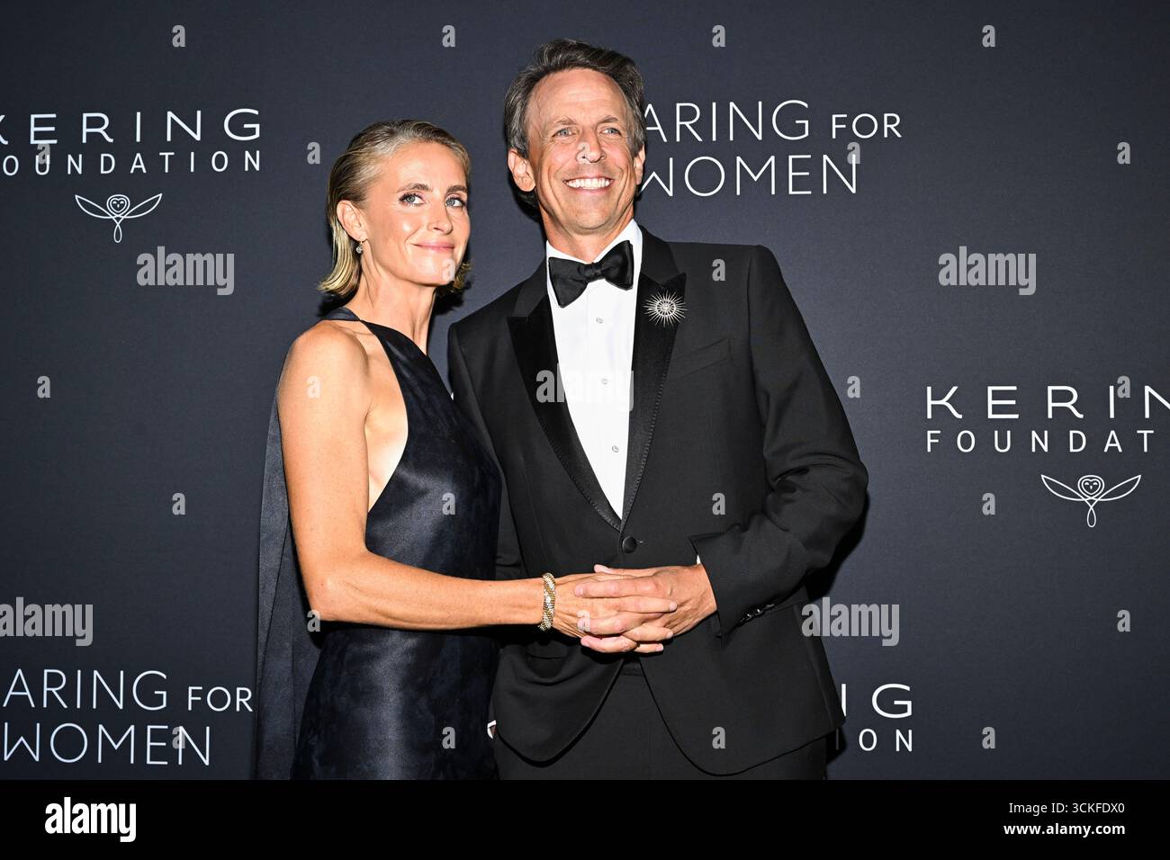 Alexi Ashe, left, and Seth Meyers attend the Kering Caring for Women ...