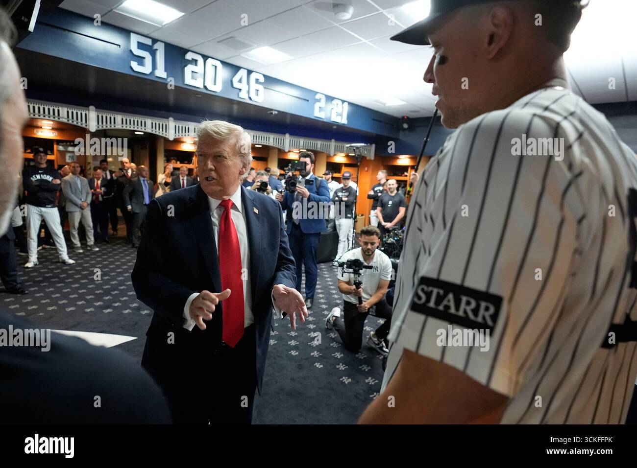 President Donald Trump talks to players including New York Yankees ...