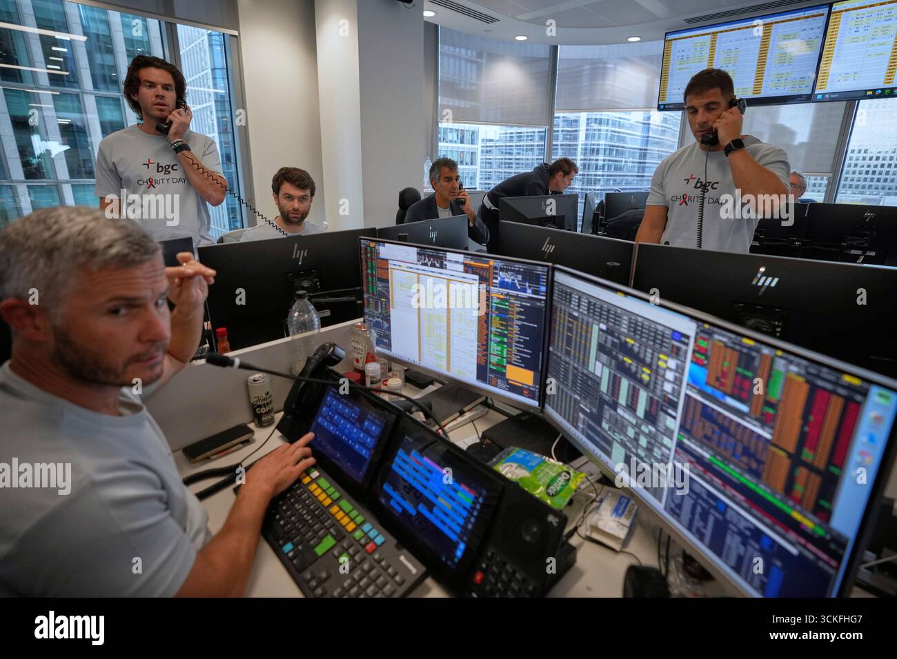 Brokers work on the trading floor at BGC Group, in London, Thursday ...