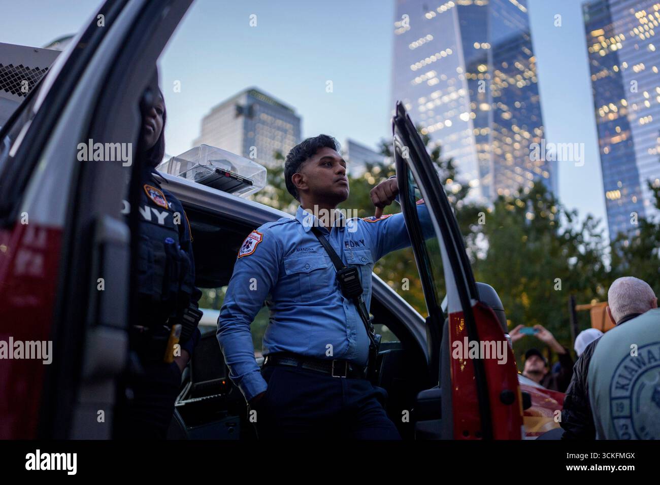 FDNY Paramedics watch as people take part in the annual Sunset Ceremony ...