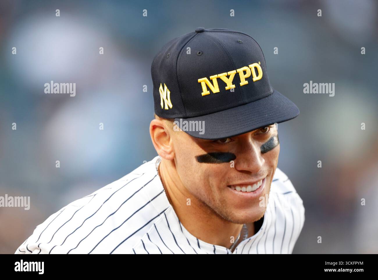 New York Yankees Aaron Judge wears an NYPD hat when he jogs on the ...