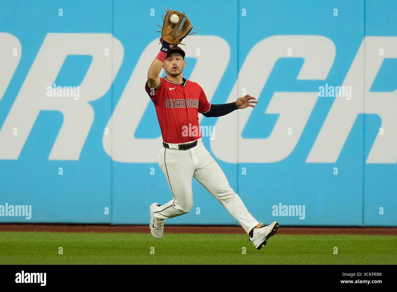 Cleveland Guardians left fielder Steven Kwan catches a fly ball hit for ...