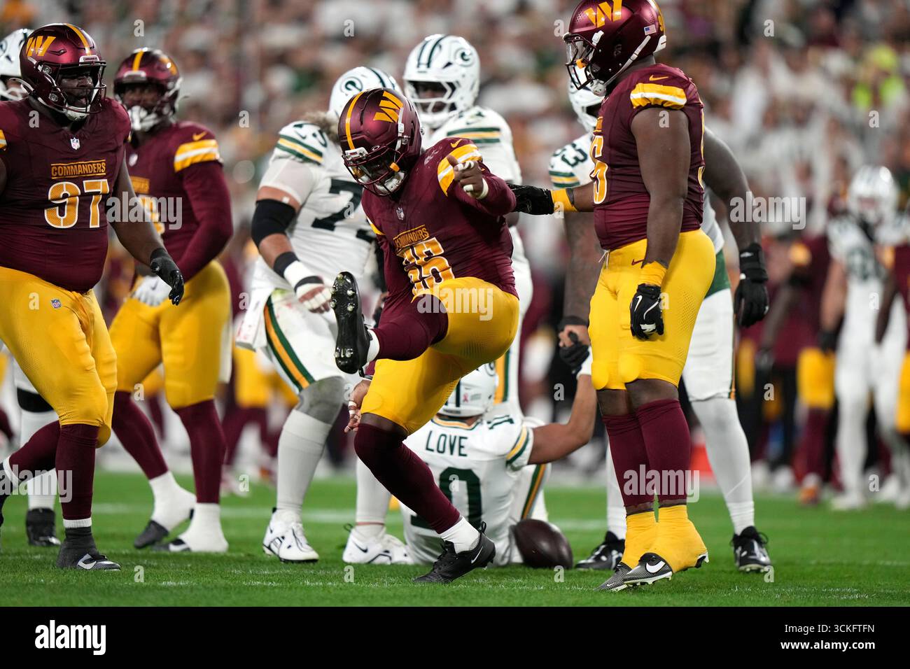 Washington Commanders defensive end Jake Martin celebrates after ...