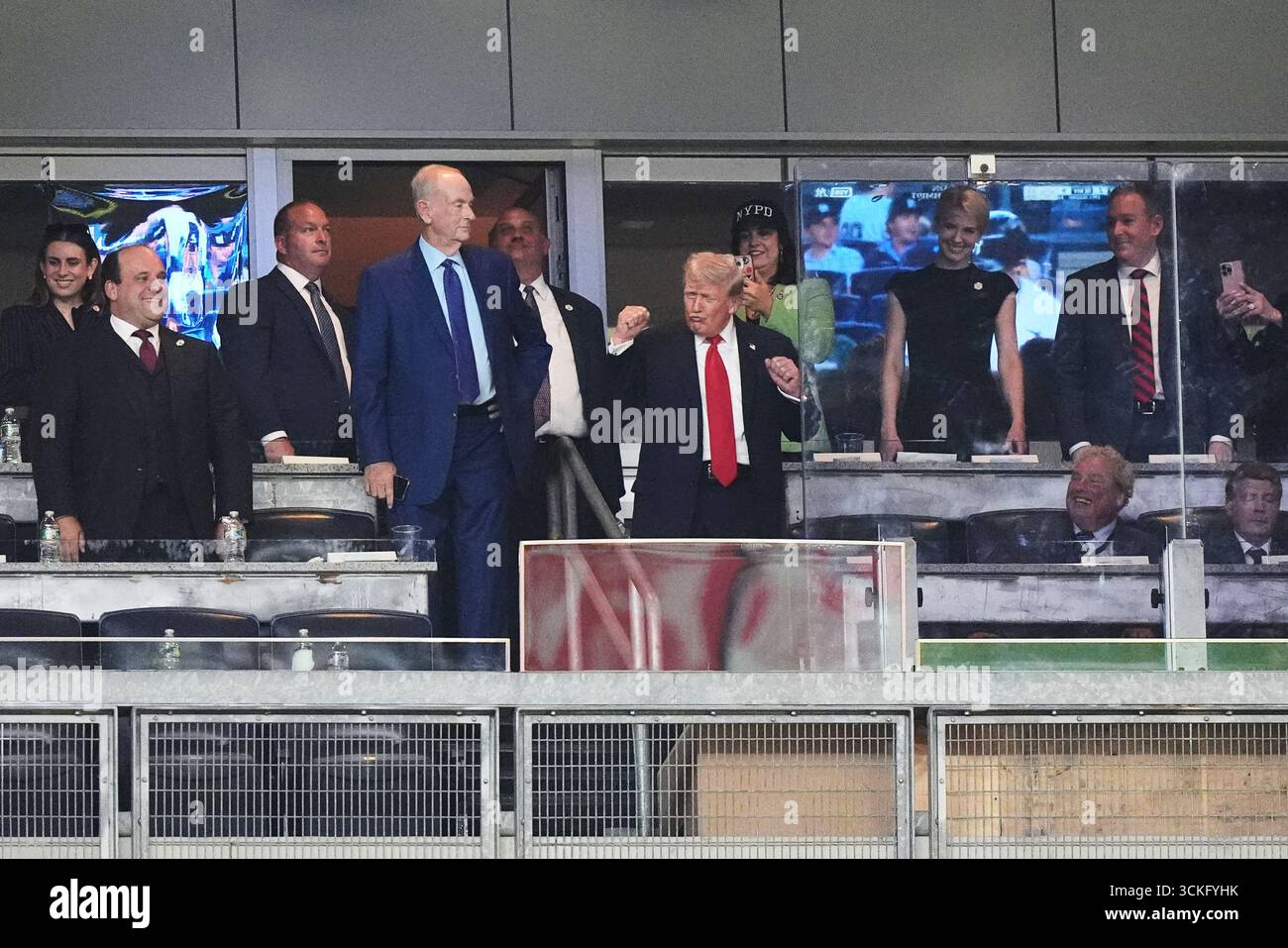 Bill O'Reilly, left, watches as President Donald Trump gestures to ...
