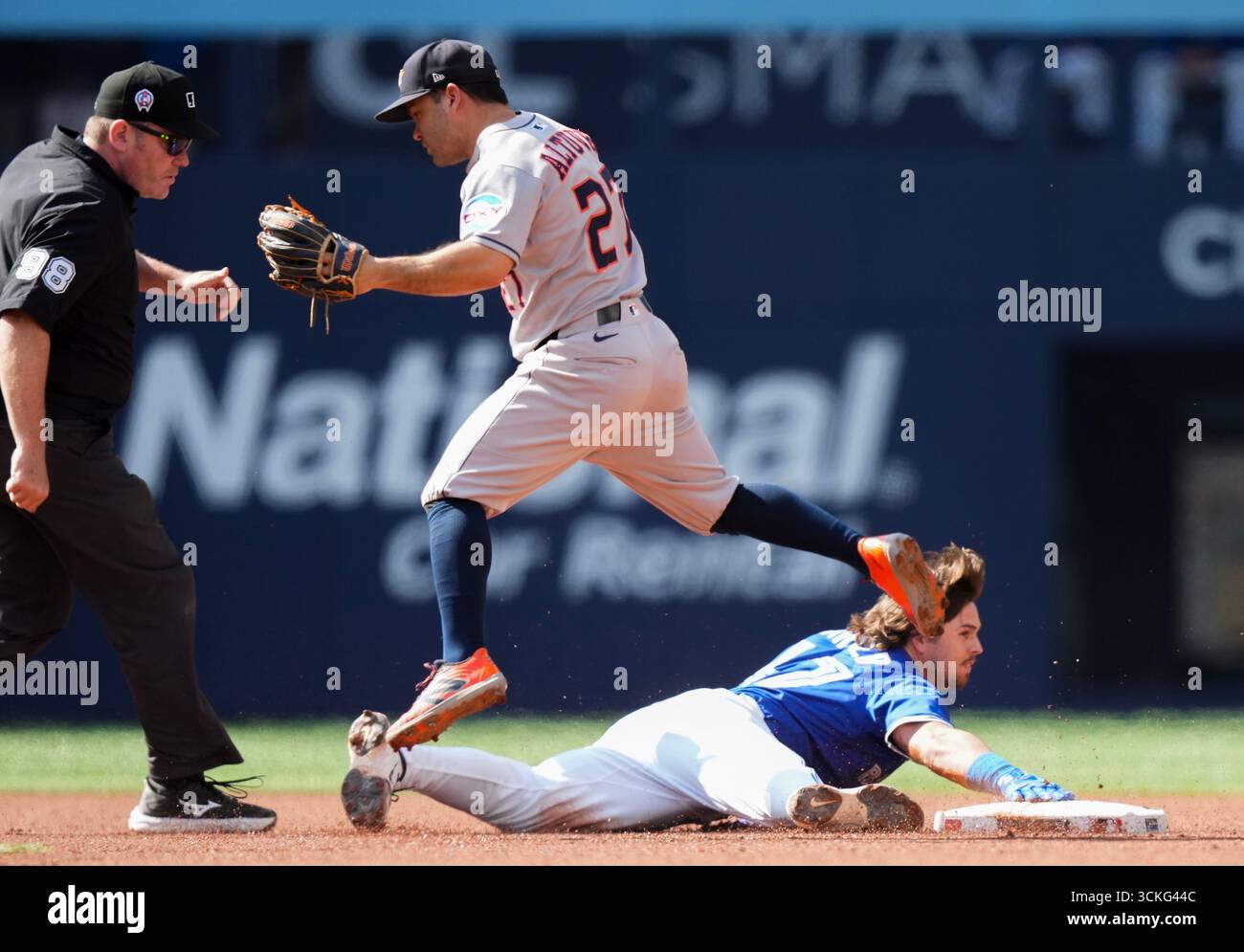 Toronto Blue Jays third base Addison Barger (47) slides safely into ...