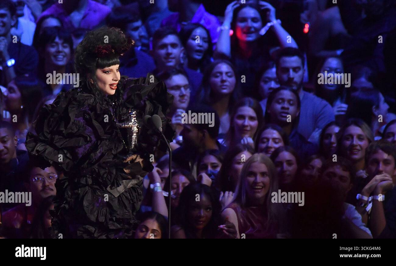 Lady Gaga receives MTV's VMA for 'Artist of the Year' onstage during ...