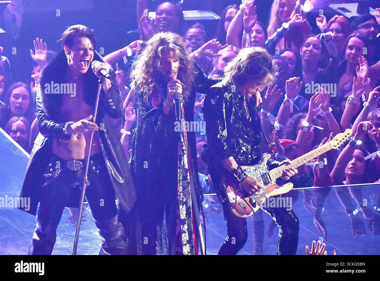 Yungblud, Steven Tyler, and Joe Perry perform Ozzy Osbourne tribute onstage during the 2025 MTV ...