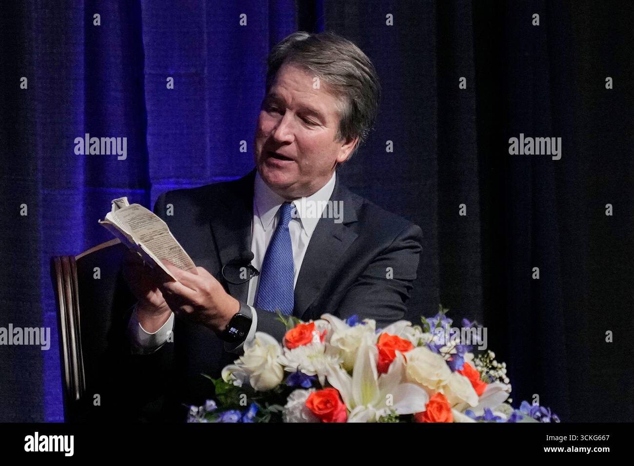 Justice Brett Kavanaugh holds his personal pocket constitution as he ...