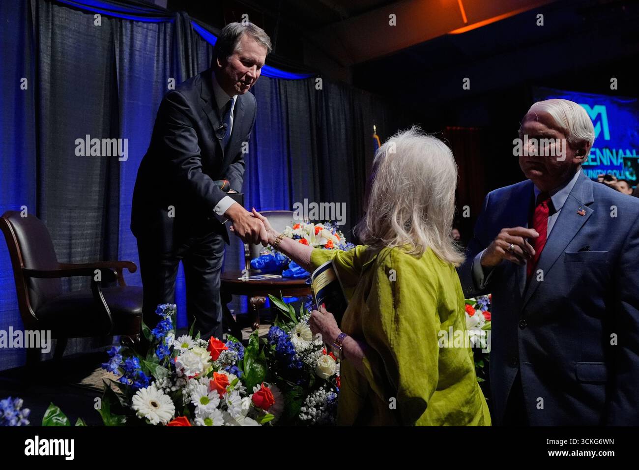 Justice Brett Kavanaugh, left, is greeted by attendees after he spoke ...
