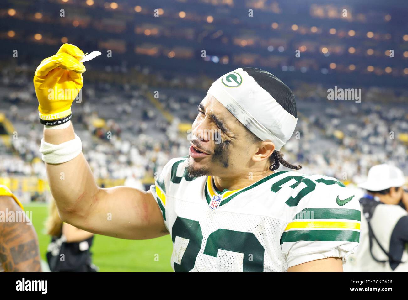 Green Bay Packers safety Evan Williams (33) celebrates the victory ...