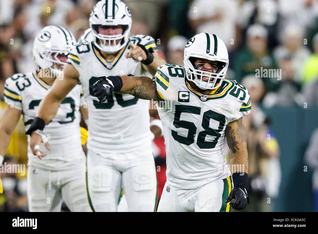 Green Bay Packers linebacker Isaiah McDuffie (58) reacts after a stop ...