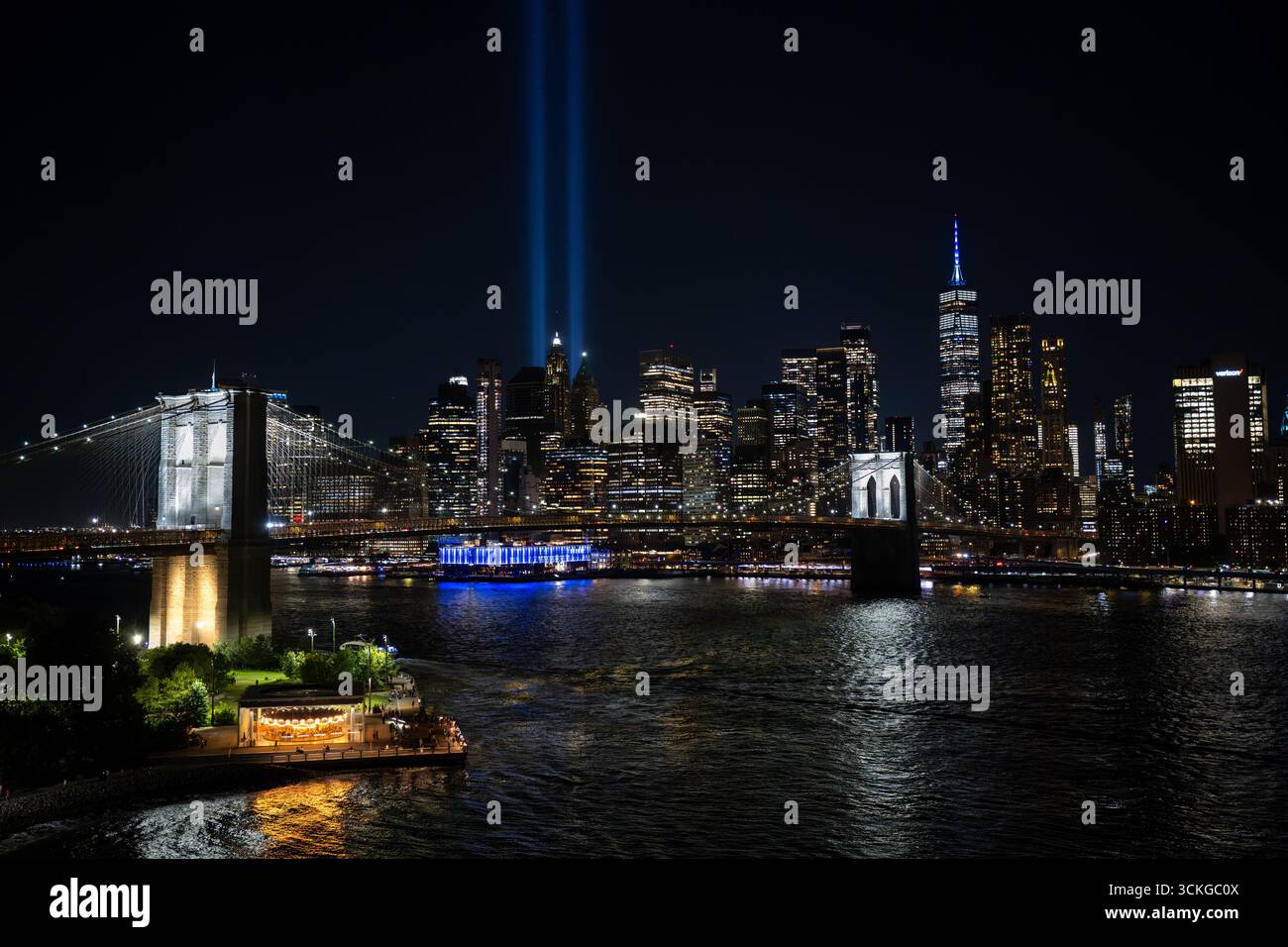 The Tribute in Light is illuminated above lower Manhattan and One World ...