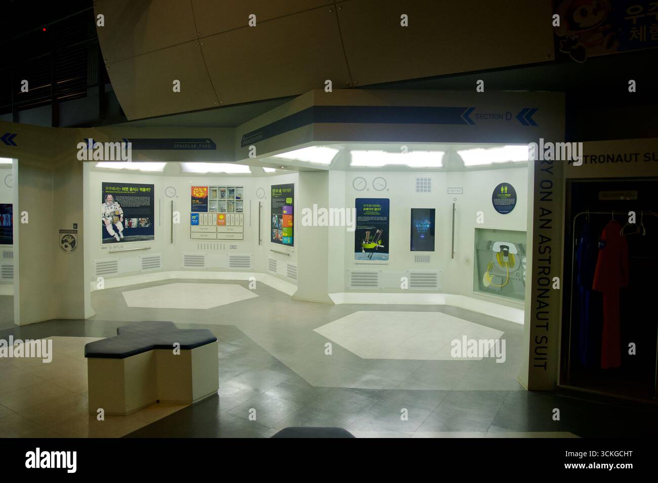 Visitors can view and try on astronaut suits in an interactive exhibit ...