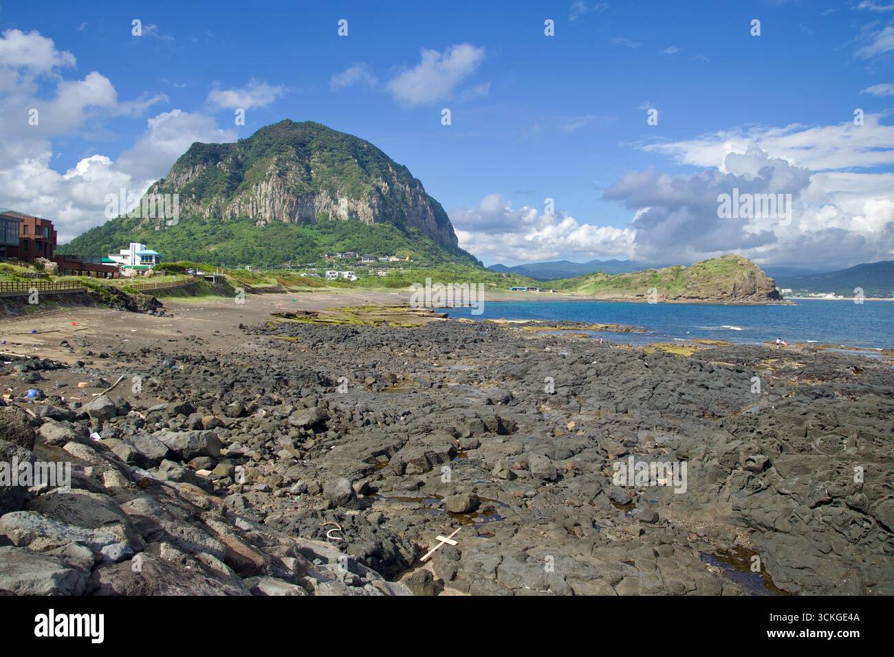 Sanbangsan’s sheer dome rises beside Yongmeori Coast, overlooking ...