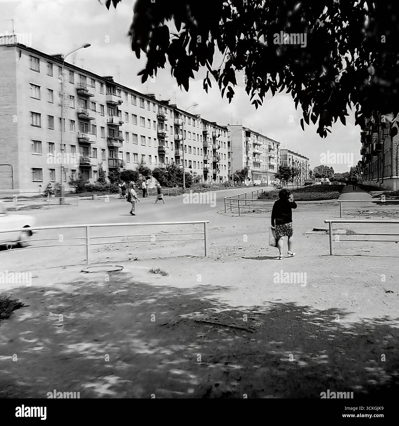An everyday street scene in the Chubar residential district of ...