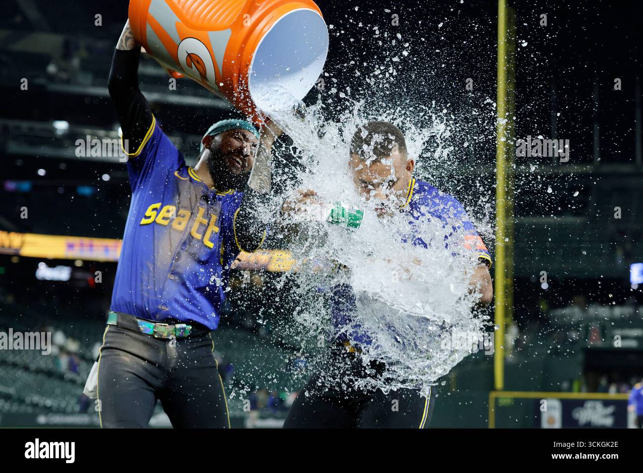 Seattle Mariners' Harry Ford is doused with ice water by J.P. Crawford ...