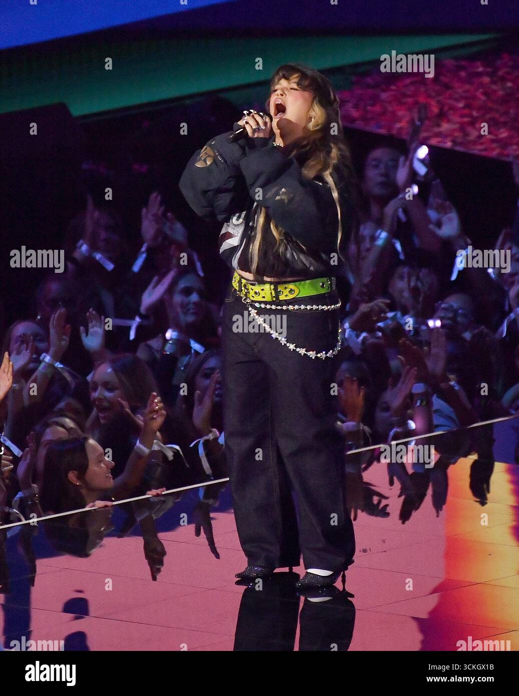 Lola Young performs on stage during the 2025 MTV Video Music Awards at ...