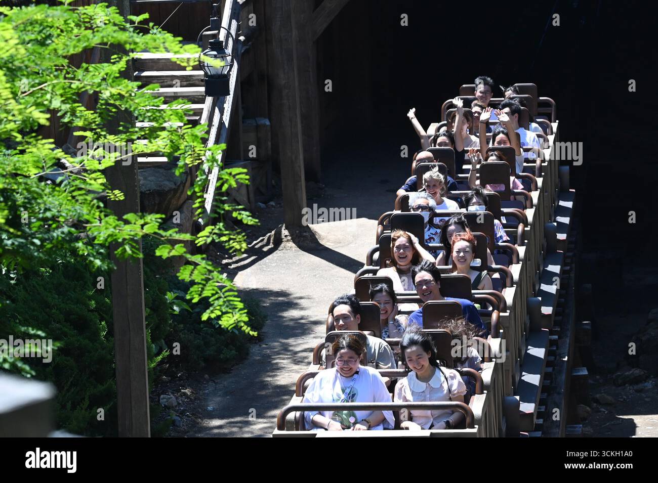 A general view showing visitors playing roller coaster in Hong Kong ...