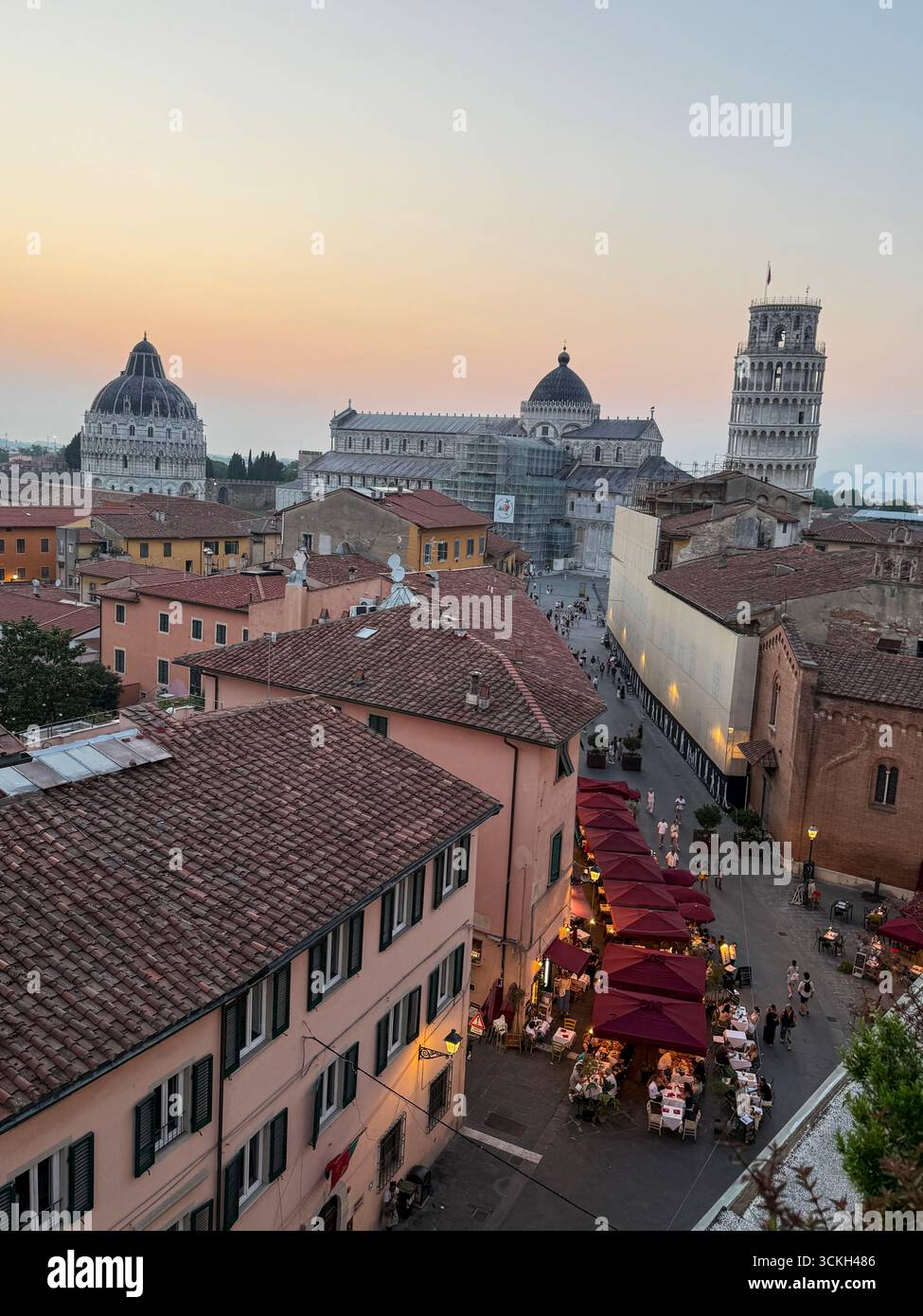 Sun setting over the famous skyline landmark of the Leaning Tower ...