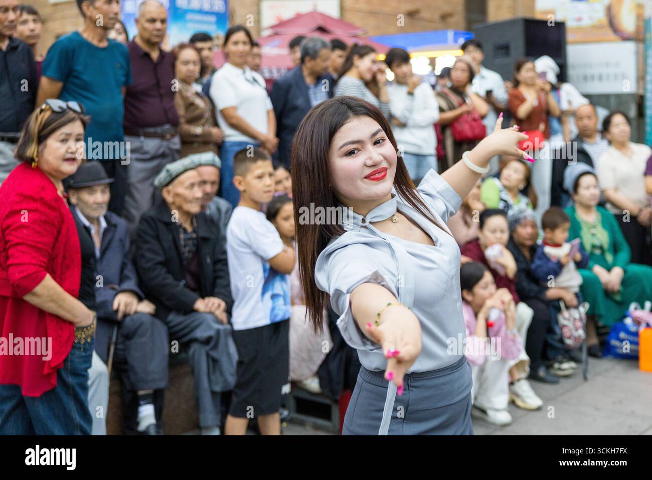 Tourists visit the Grand Bazaar in Urumqi City, northwest China's ...
